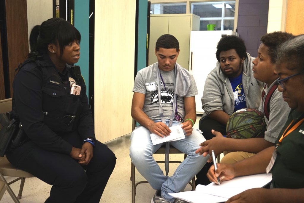 Teens and police strive to surmount barriers through personal ...